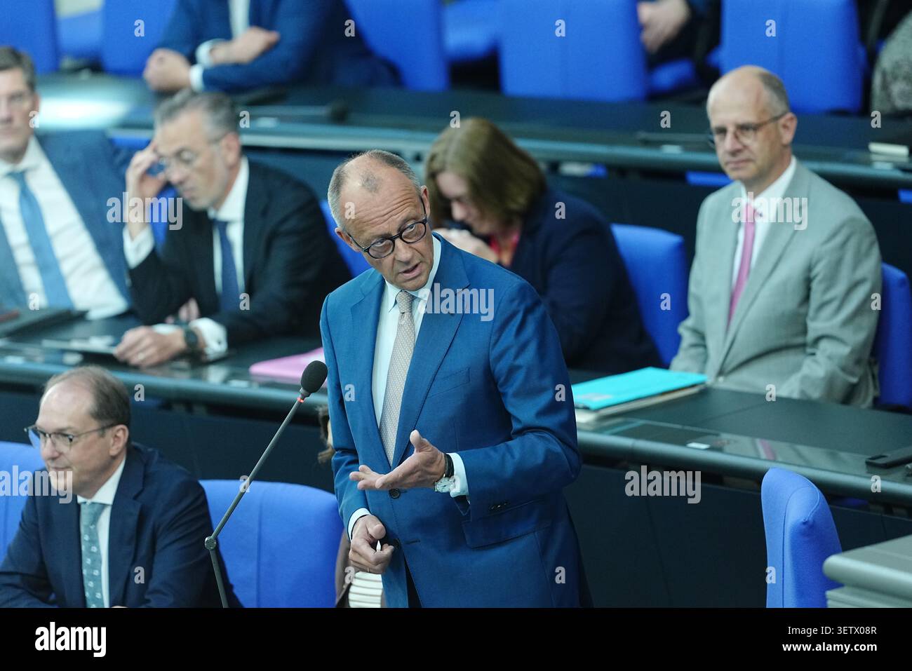 24 June 2026, Berlin: Chancellor Friedrich Merz (CDU, right) speaks ...