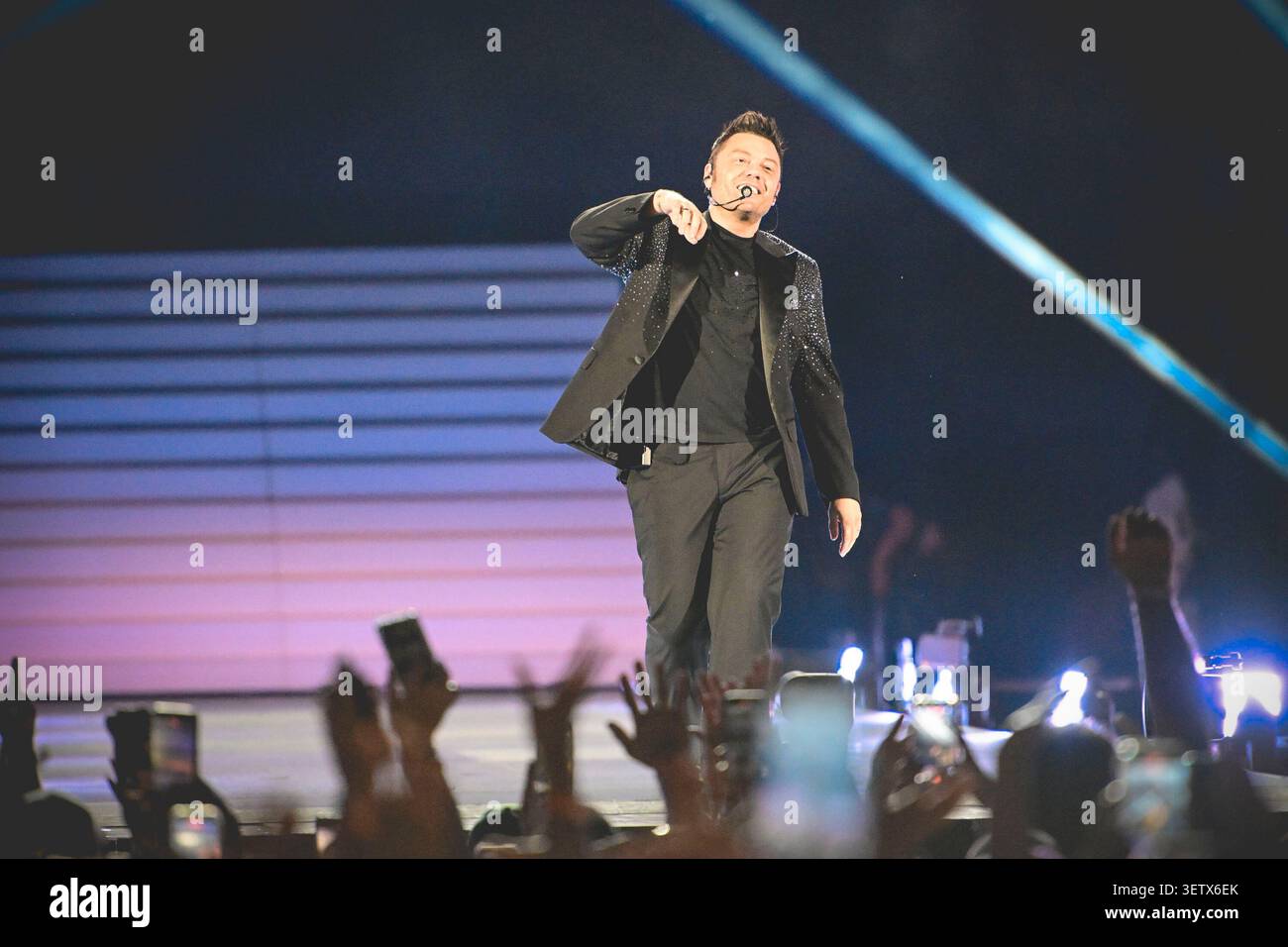 Italian singer Tiziano Ferro, seen performing live on stage at Stadium ...
