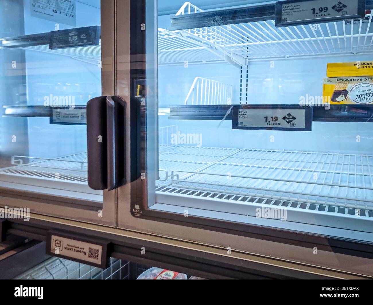 Torquay, UK. 24 June 2026. Shelves and freezers normally stocked with ...