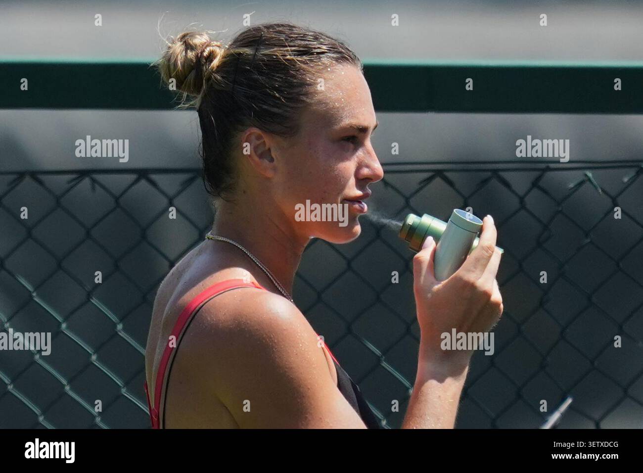 Aryna Sabalenka of Belarus cools herself during a practice session ...