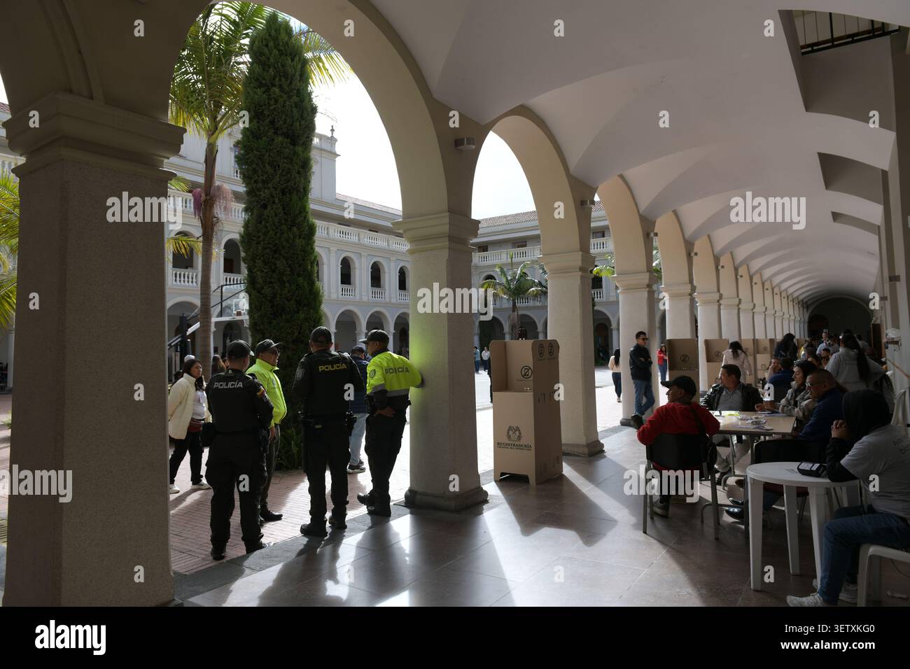 Colombian police guard the electoral process during the runoff election ...