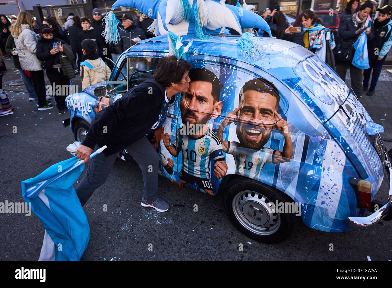 Julia Godoy kisses a car with the picture of Lionel Messi during a ...
