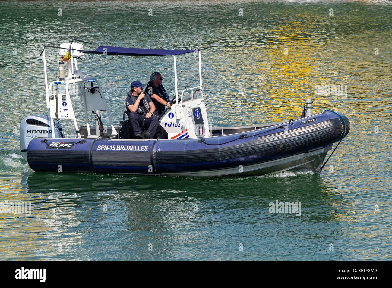 A baptizing ceremony for the new Belgian minesweeper Vessel M940 is ...