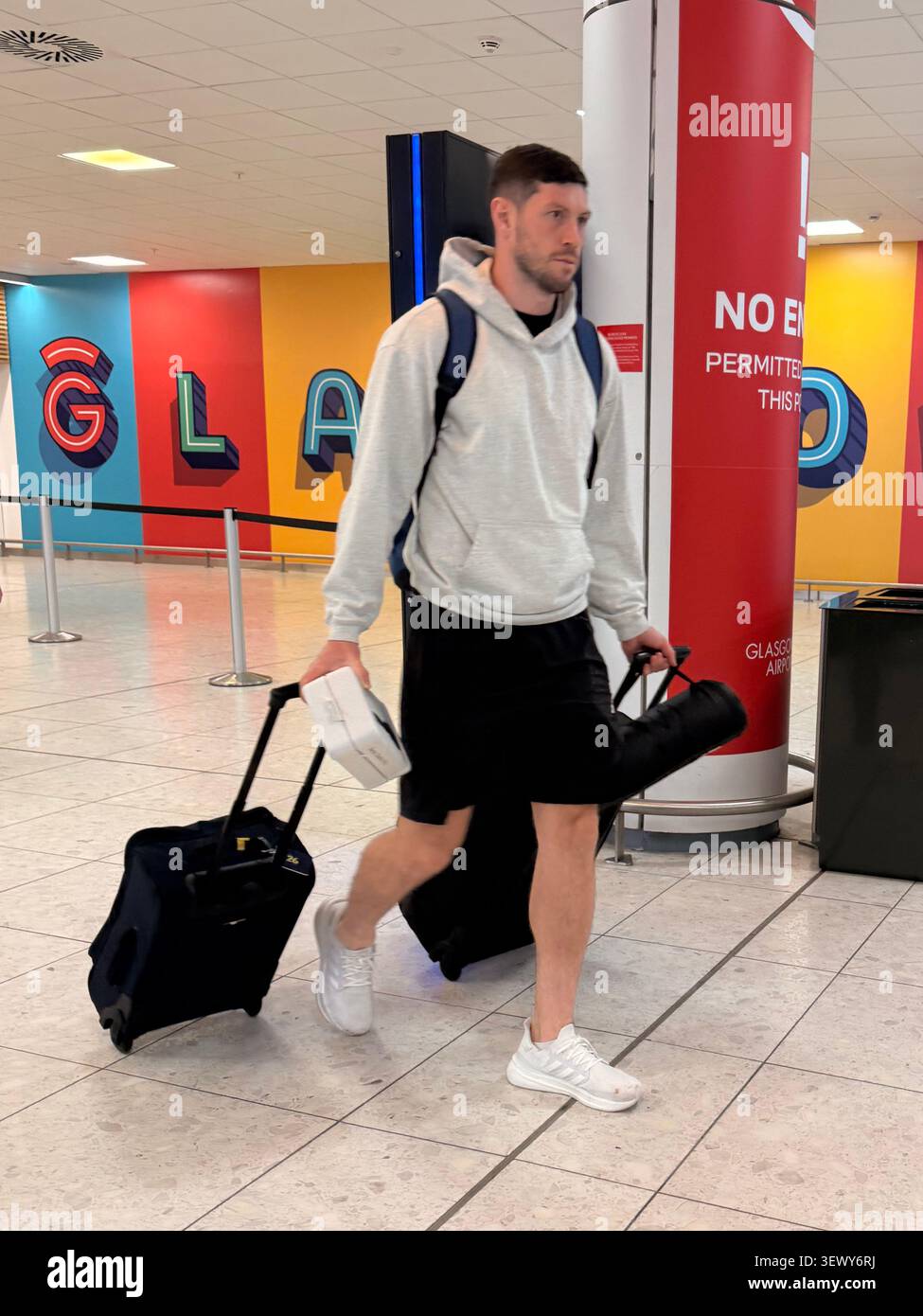Scotland's Scott McKenna arriving at Glasgow airport. Scotland's ...