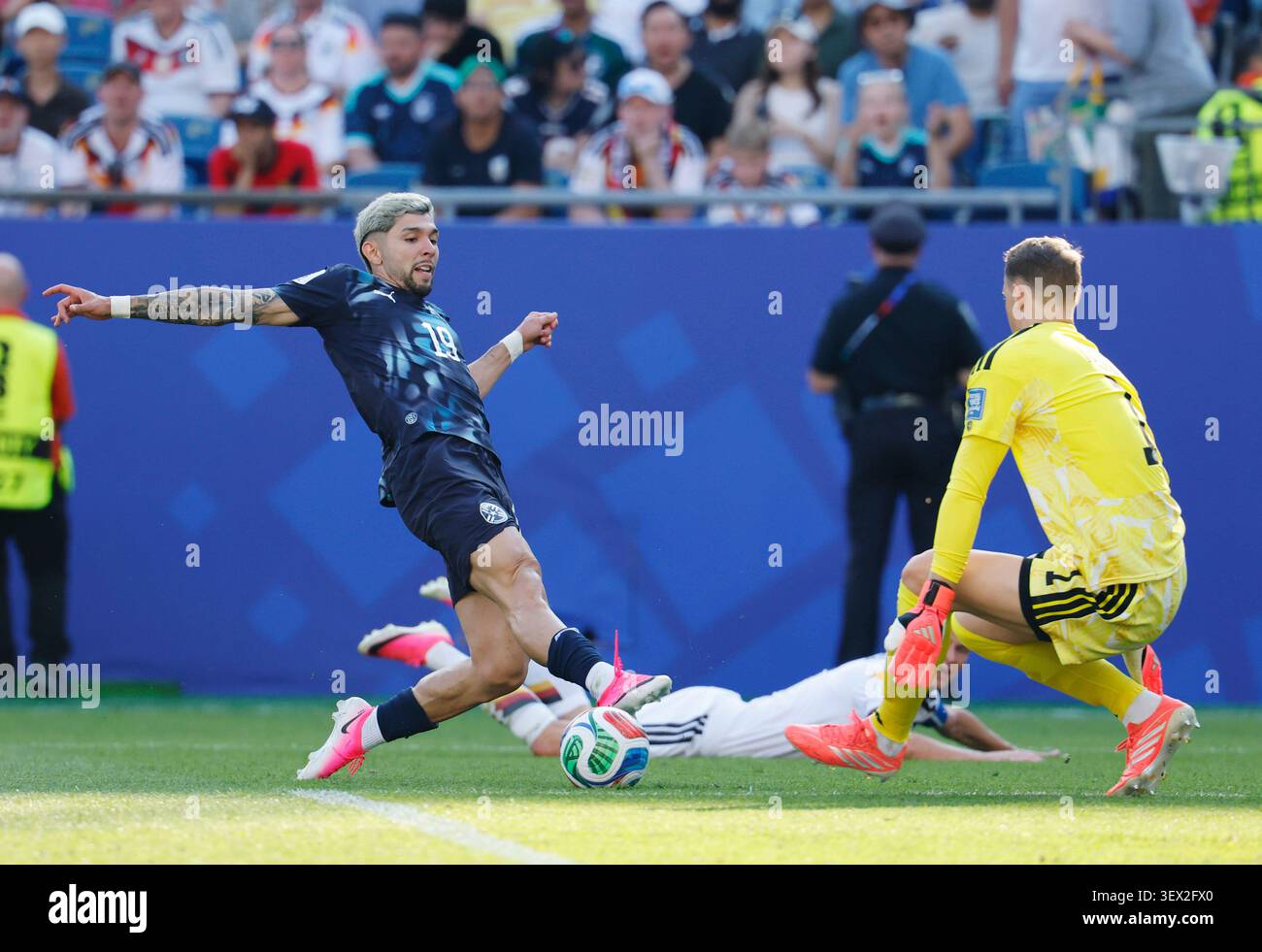 Paraguay's Julio Enciso (19) tries to score past Germany's goalkeeper ...
