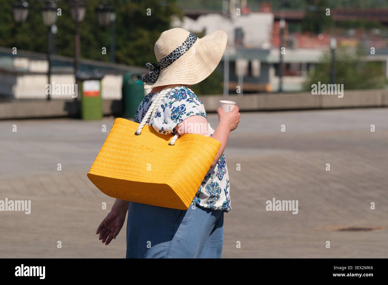 June 29, 2026, Warsaw, Masovian Voivodeship, Poland: A woman in a wide ...