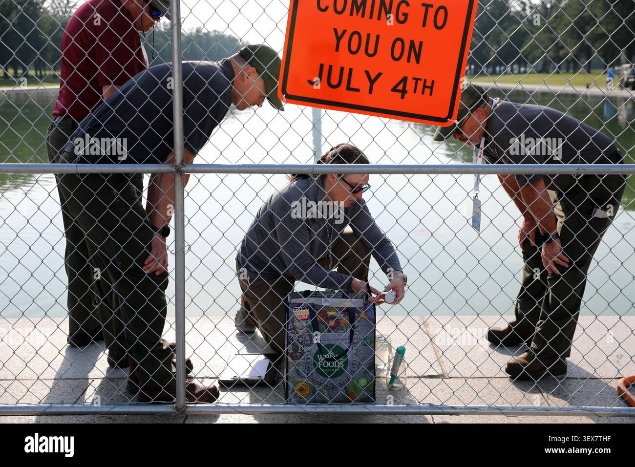 National Park Service employees check a water sample at the Lincoln ...