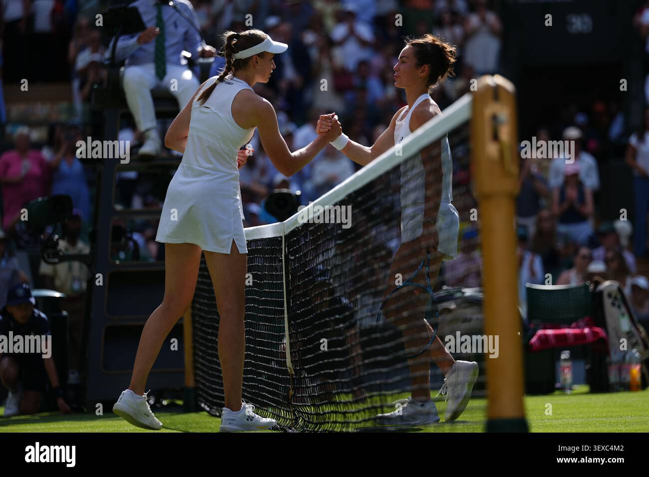 Elena Rybakina of Kazakhstan, left, and Lois Boisson of France shake ...