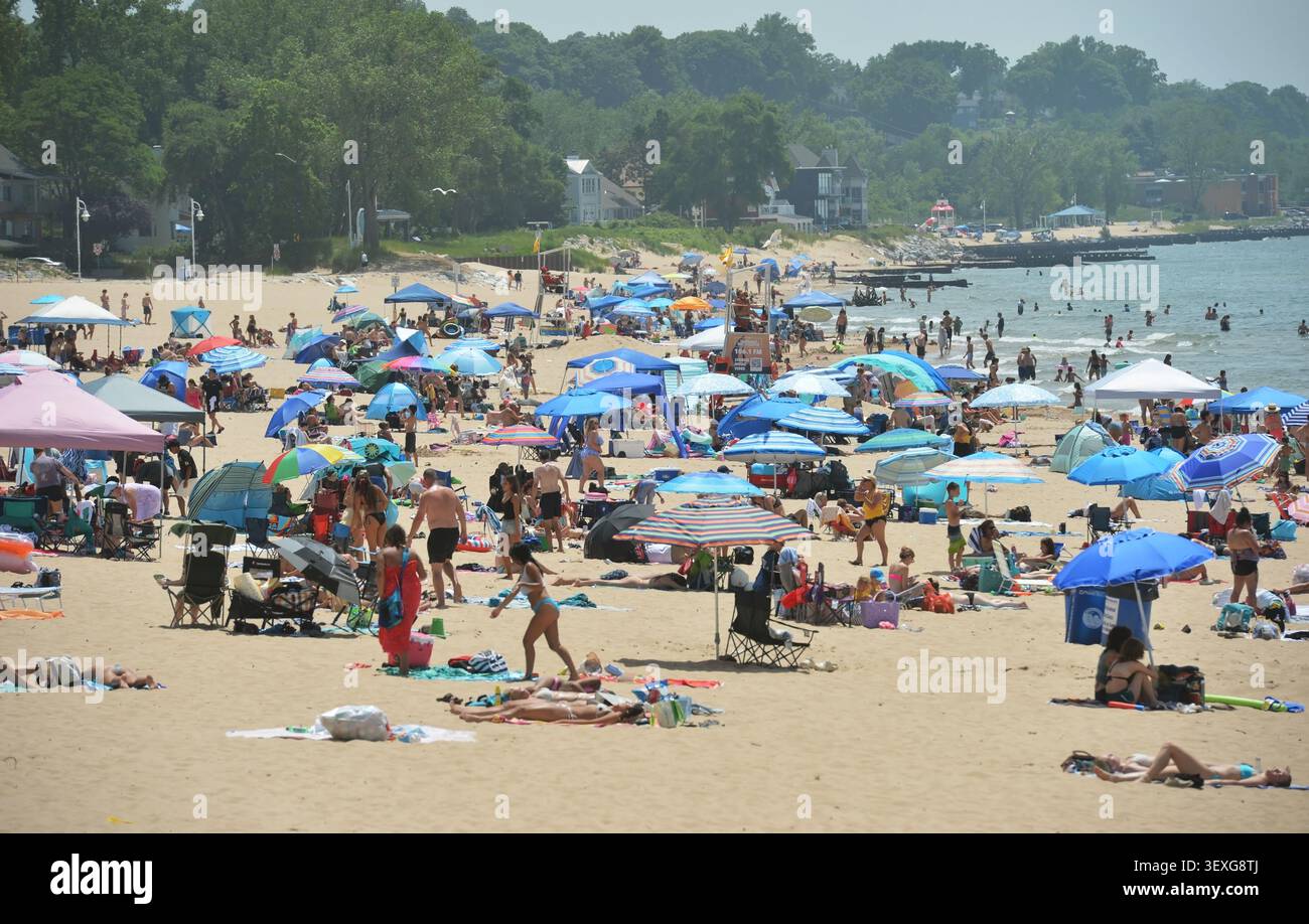 Beachgoers pack Silver Beach along Lake Michigan Tuesday, June 30, 2026 ...