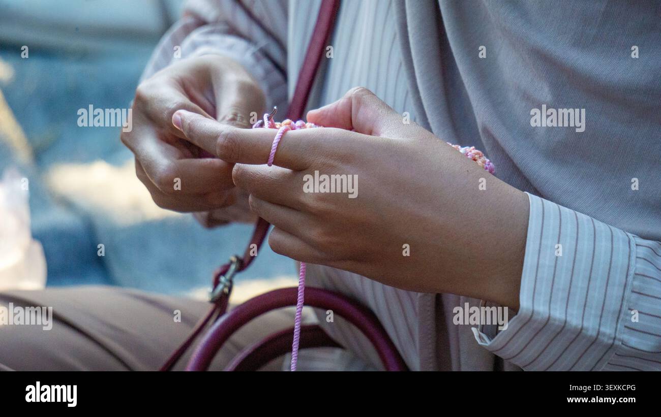 Creating items (lipstick holder) using the craft of knitting. An ...