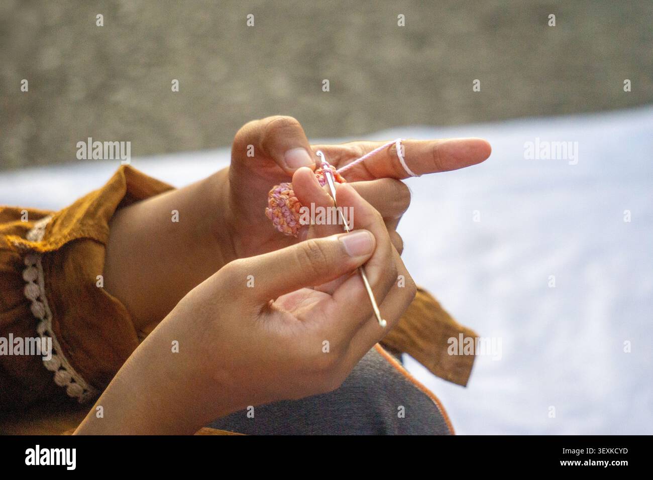 Creating items (lipstick holder) using the craft of knitting. An ...