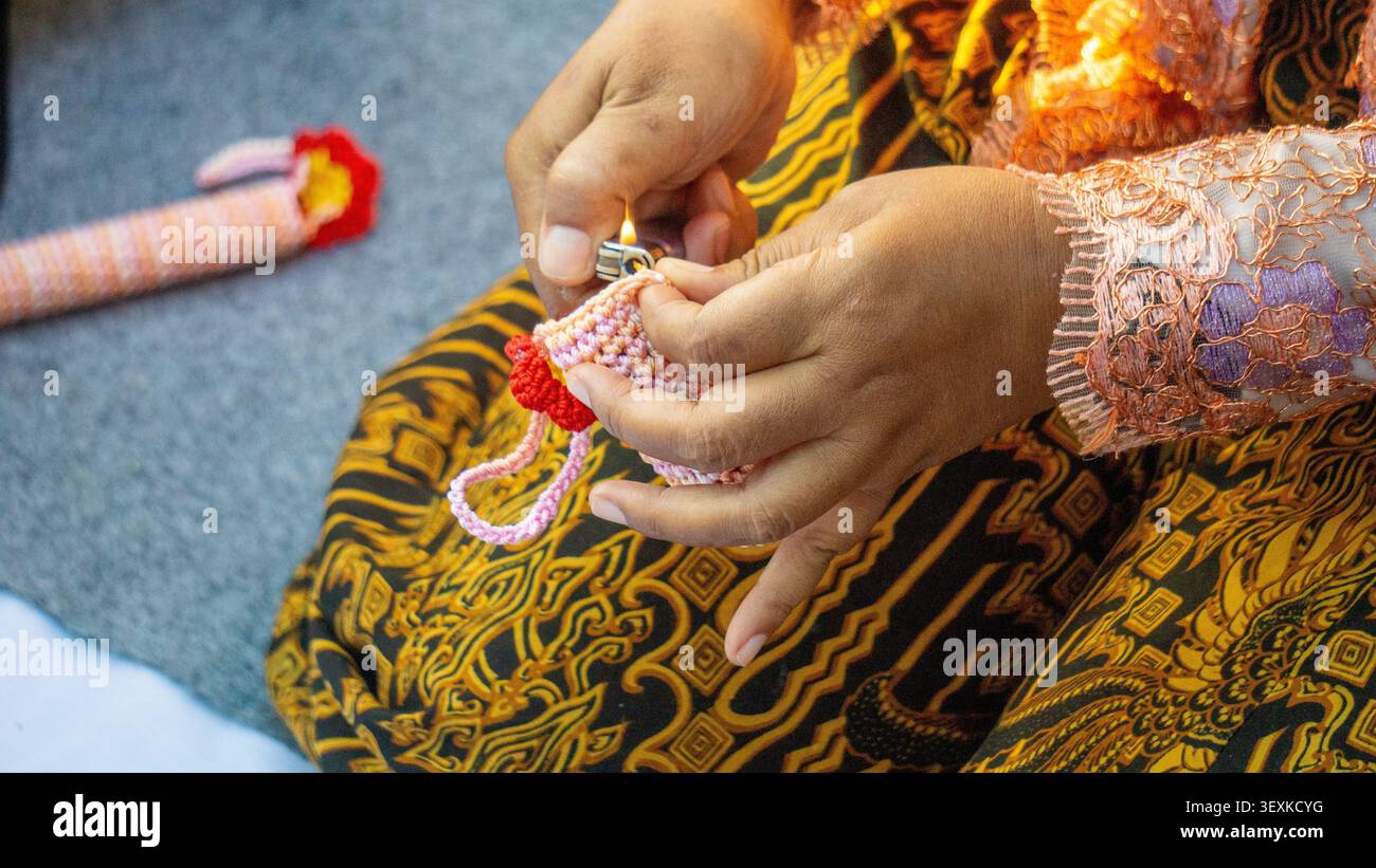 Creating items (lipstick holder) using the craft of knitting. An ...