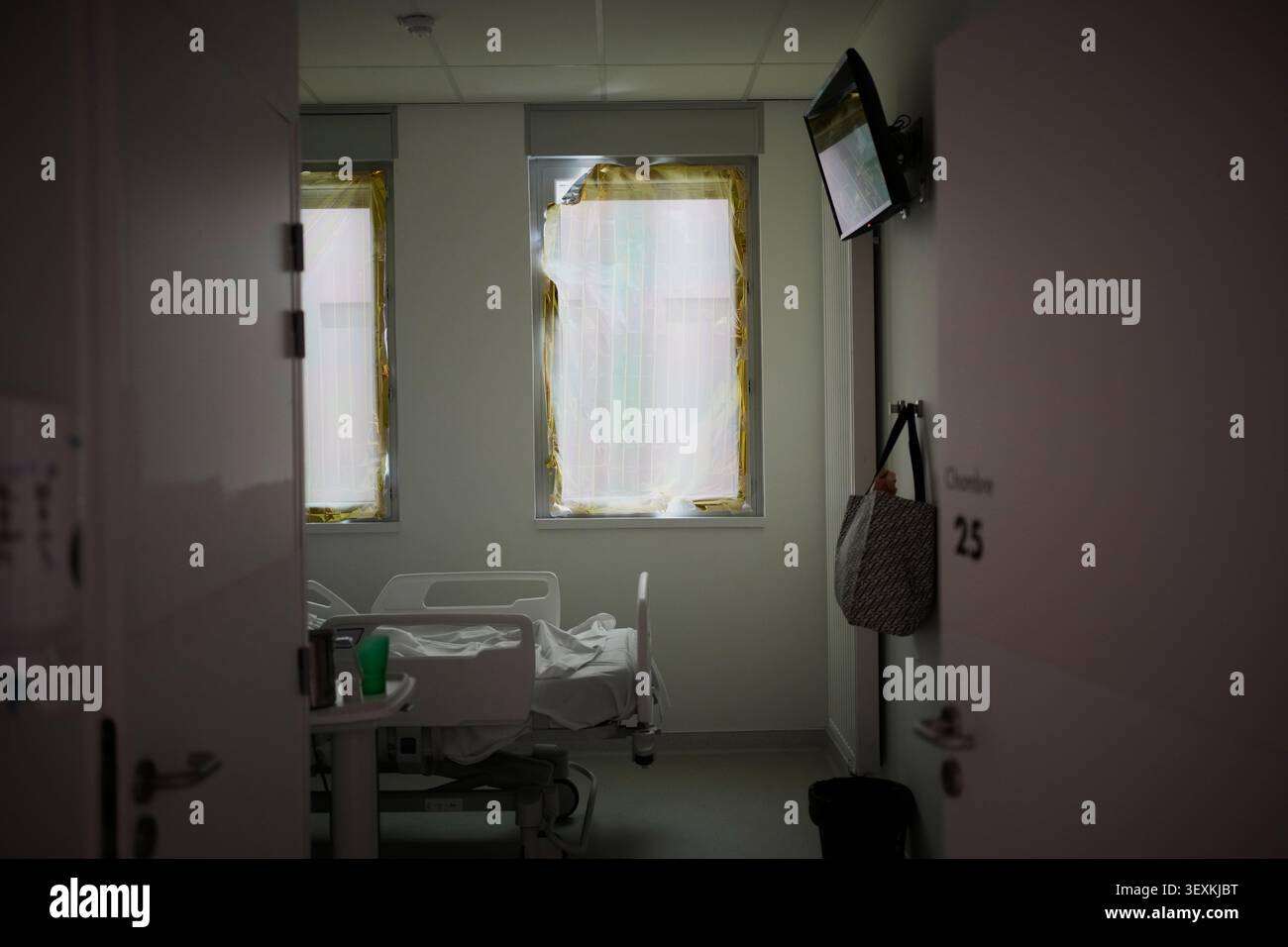 A heat-protection is set on a window at the emergency department of the ...