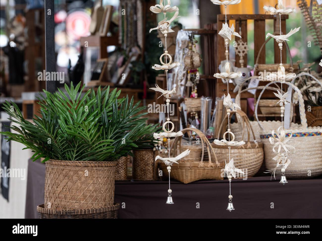 Handwoven bamboo mobile garland with bird and fish figures and wooden ...