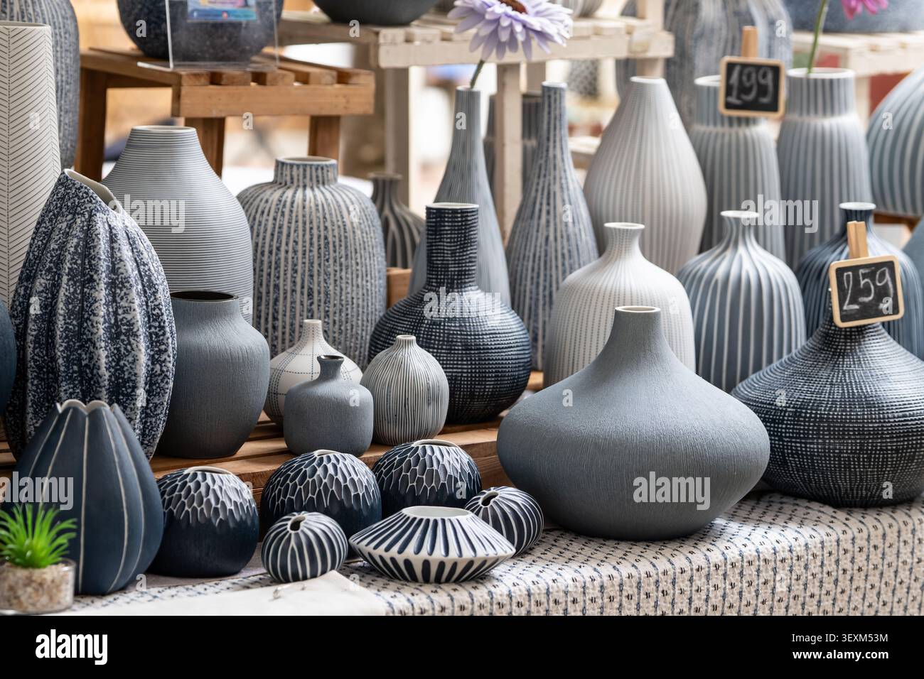 Large collection of gray ceramic vases in various sizes and textures at ...