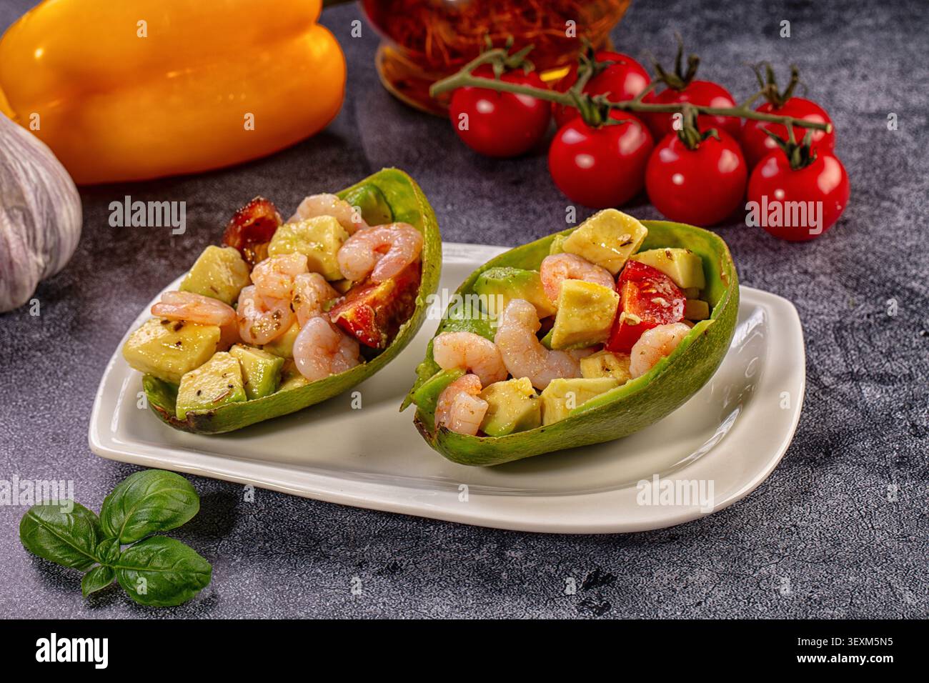 Avocado halves stuffed with cooked shrimp, diced tomato, avocado cubes ...