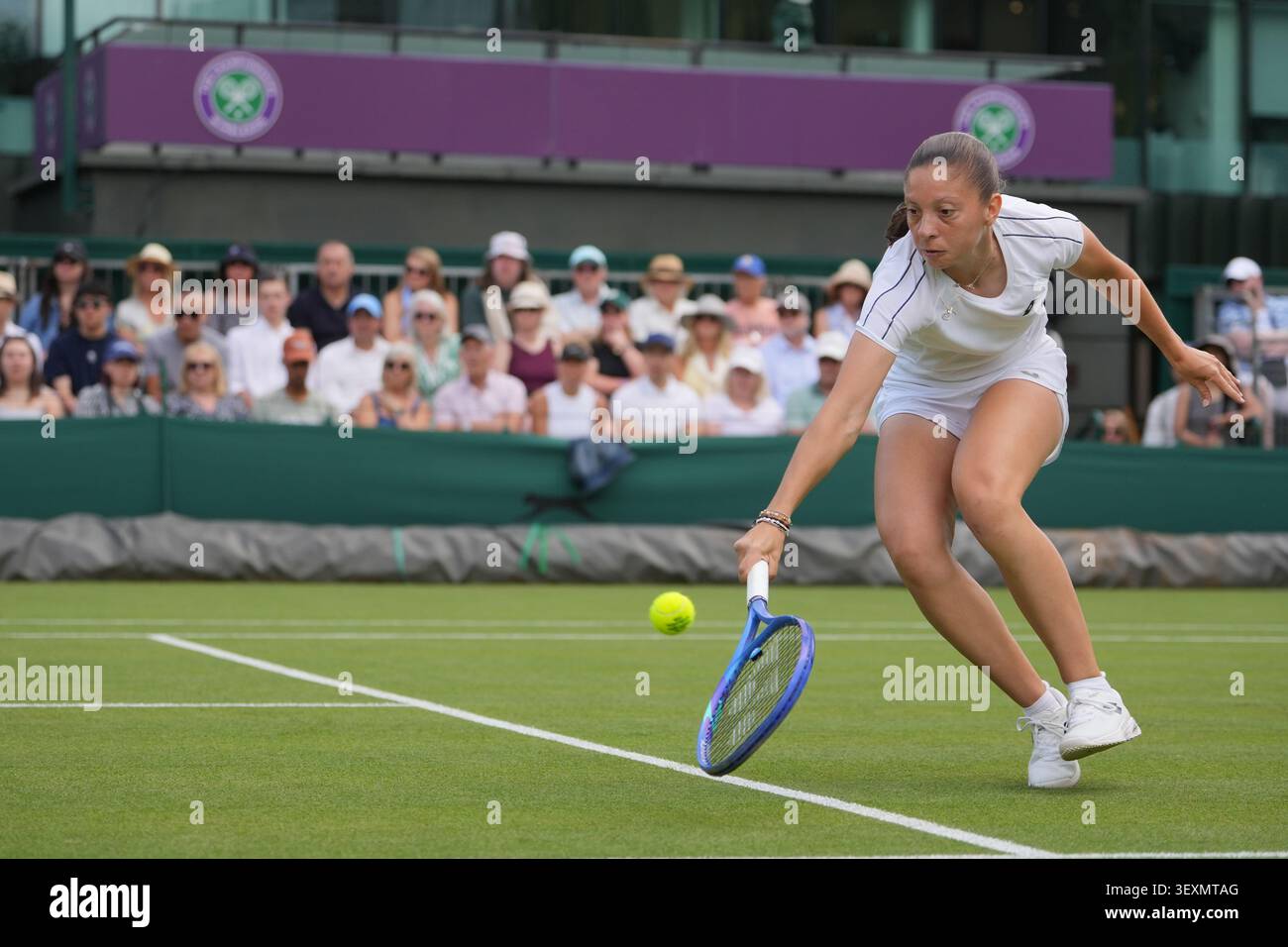 Antonia Ruzic of Croatia returns the ball to Jelena Ostapenko of Latvia ...