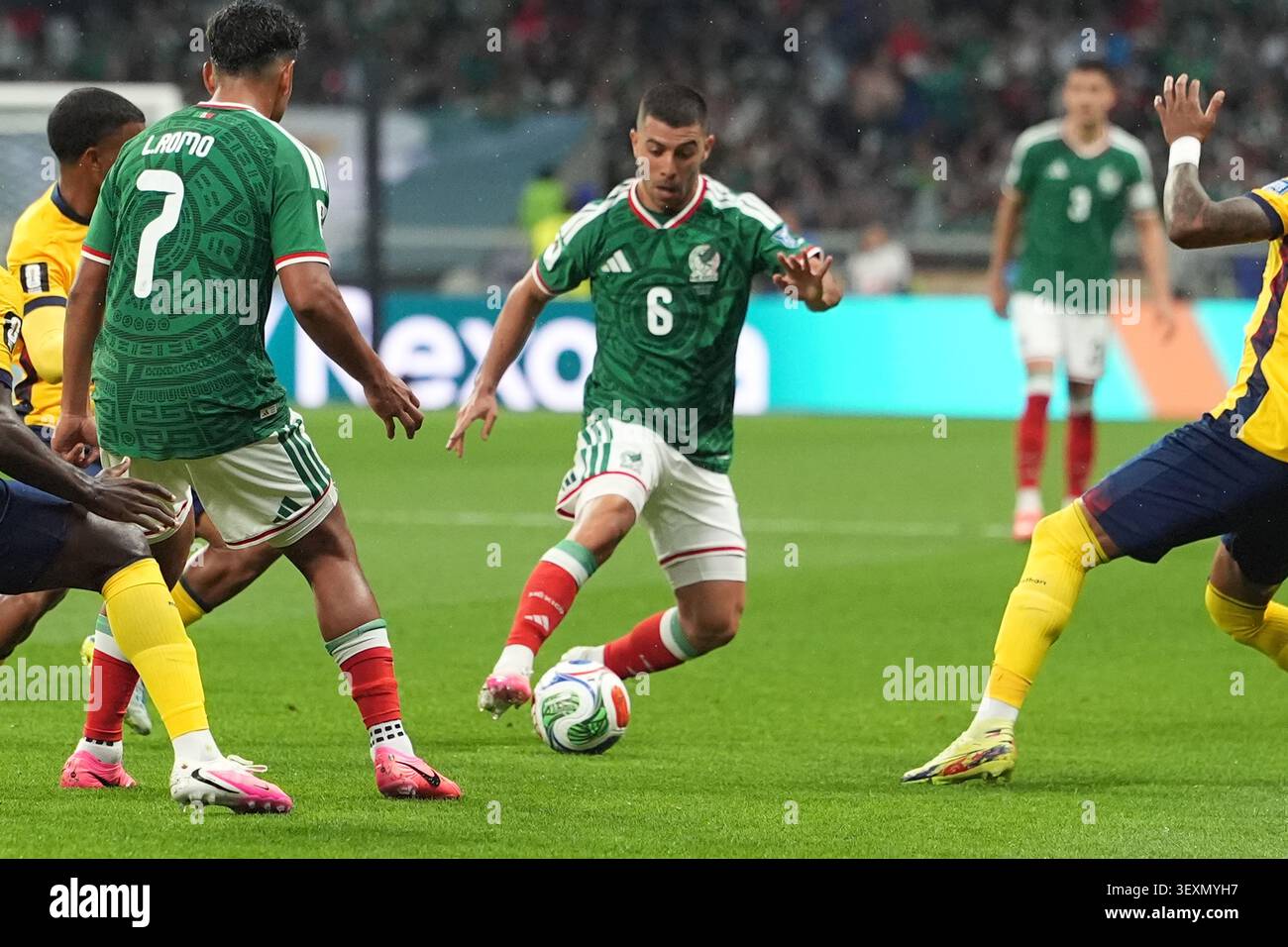 Erik Lira #6 of Mexico national team dribbles the ball during the FIFA ...