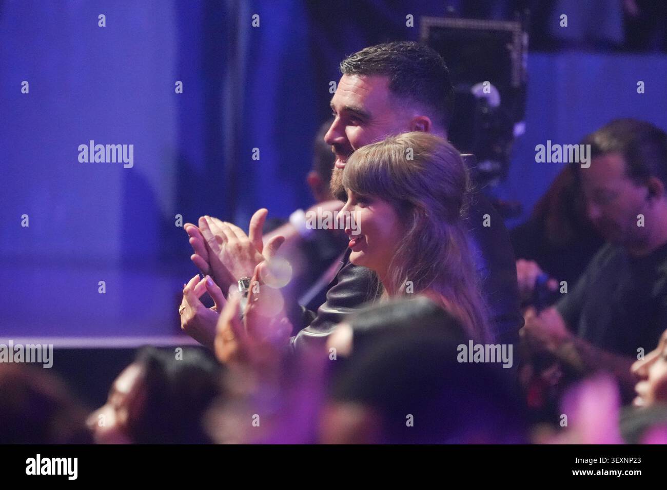 FILE - Taylor Swift, left, and Travis Kelce appear in the audience ...
