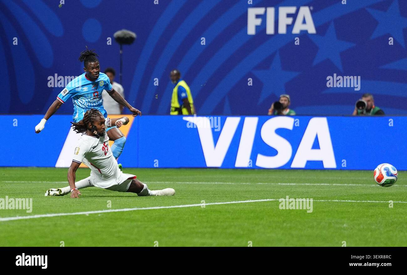 Congo DR's Brian Cipenga scores their side's first goal of the game ...