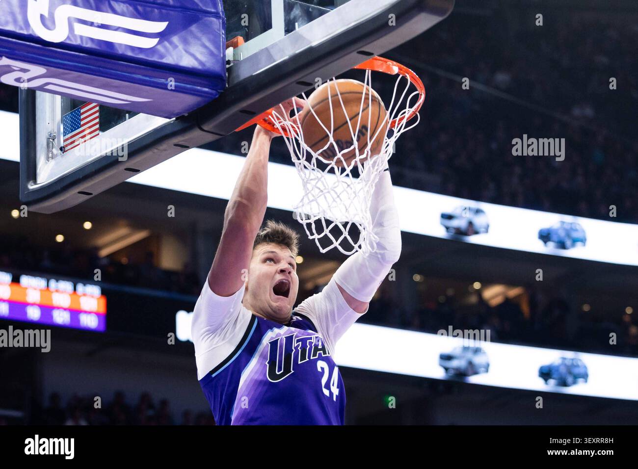 FILE - Utah Jazz center Walker Kessler (24) dunks during the second ...