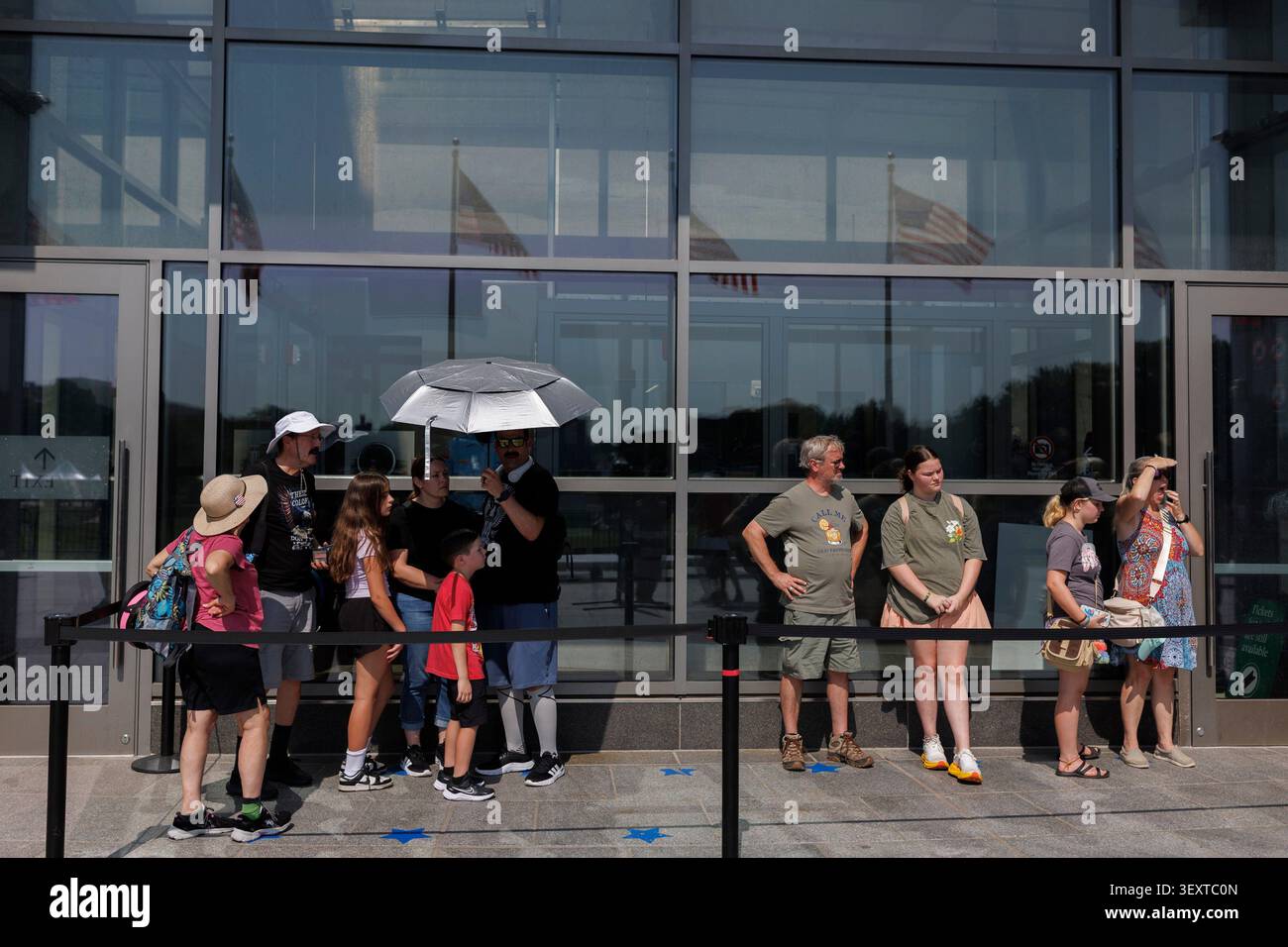 Visitors wait to enter the Washington Monument, Wednesday, July 1, 2026 ...