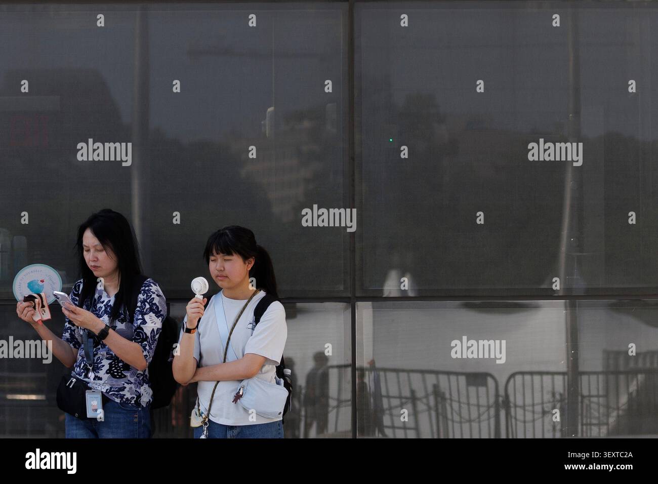 Visitors wait to enter the Washington Monument, Wednesday, July 1, 2026 ...