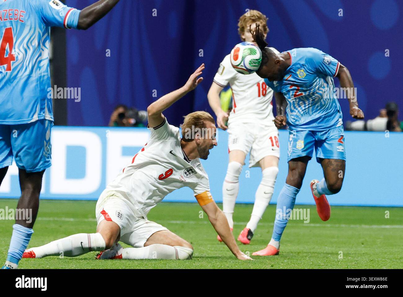 Congo's Aaron Wan-Bissaka (2) heads the ball beside England's Harry ...