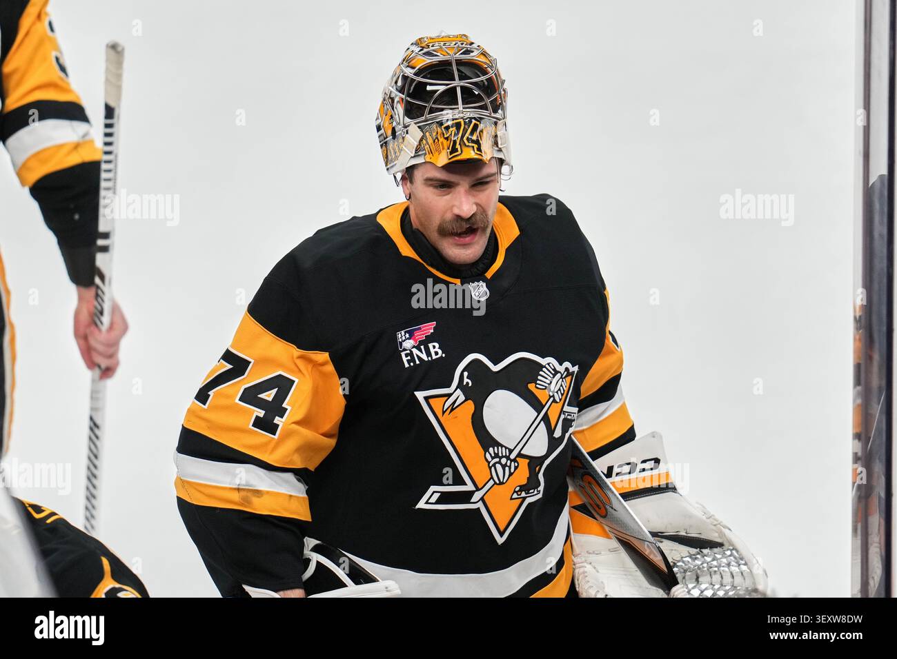 FILE - Pittsburgh Penguins goaltender Stuart Skinner takes a timeout ...