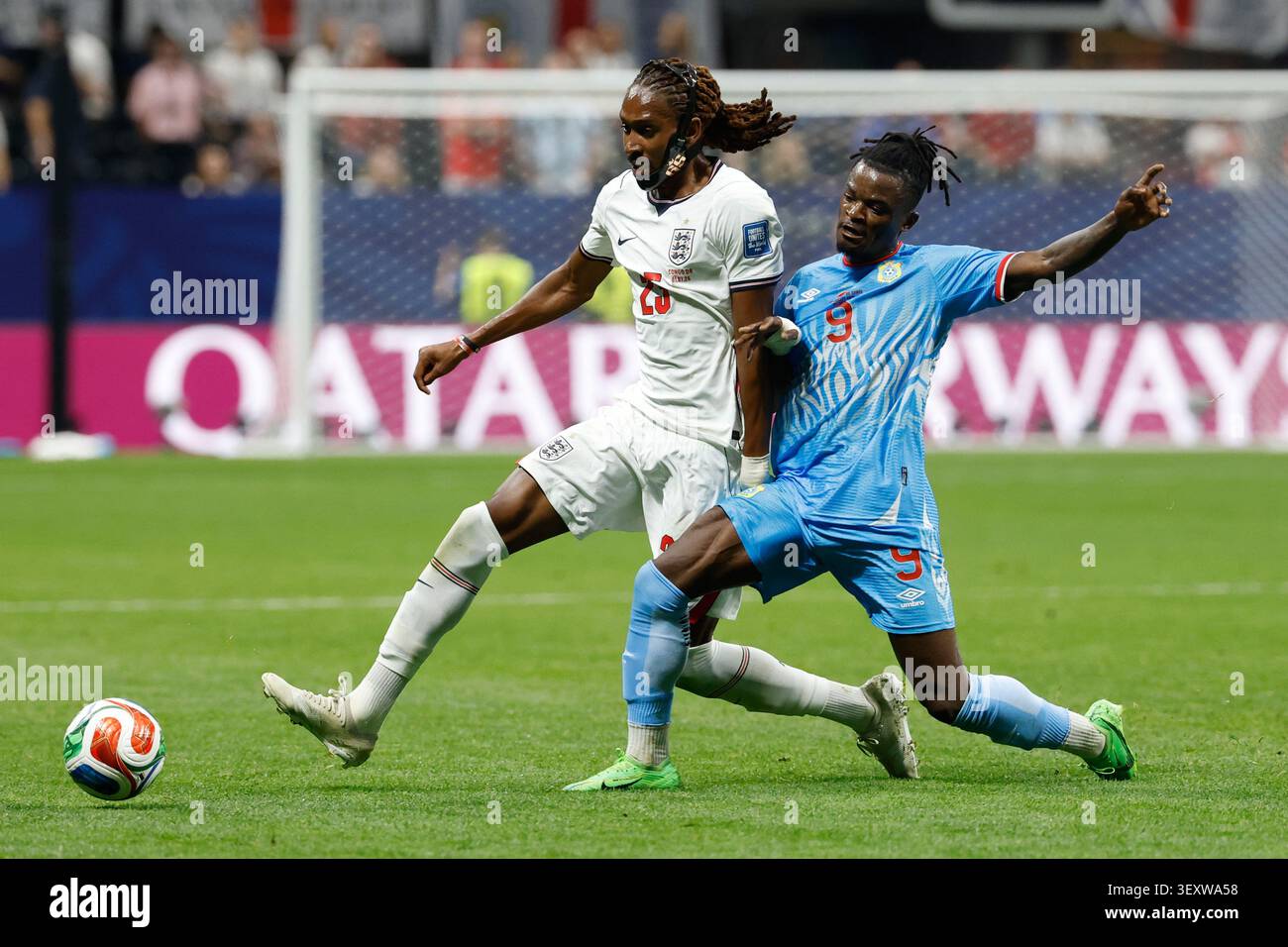 England's Djed Spence (25) and Congo's Brian Cipenga battle for the ...