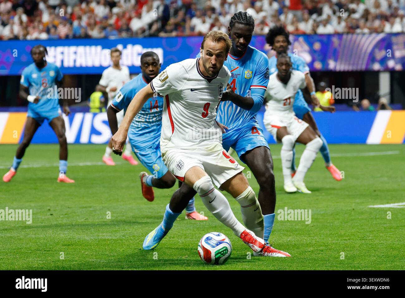 England's Harry Kane (9) and Congo's Axel Tuanzebe battle for the ball ...