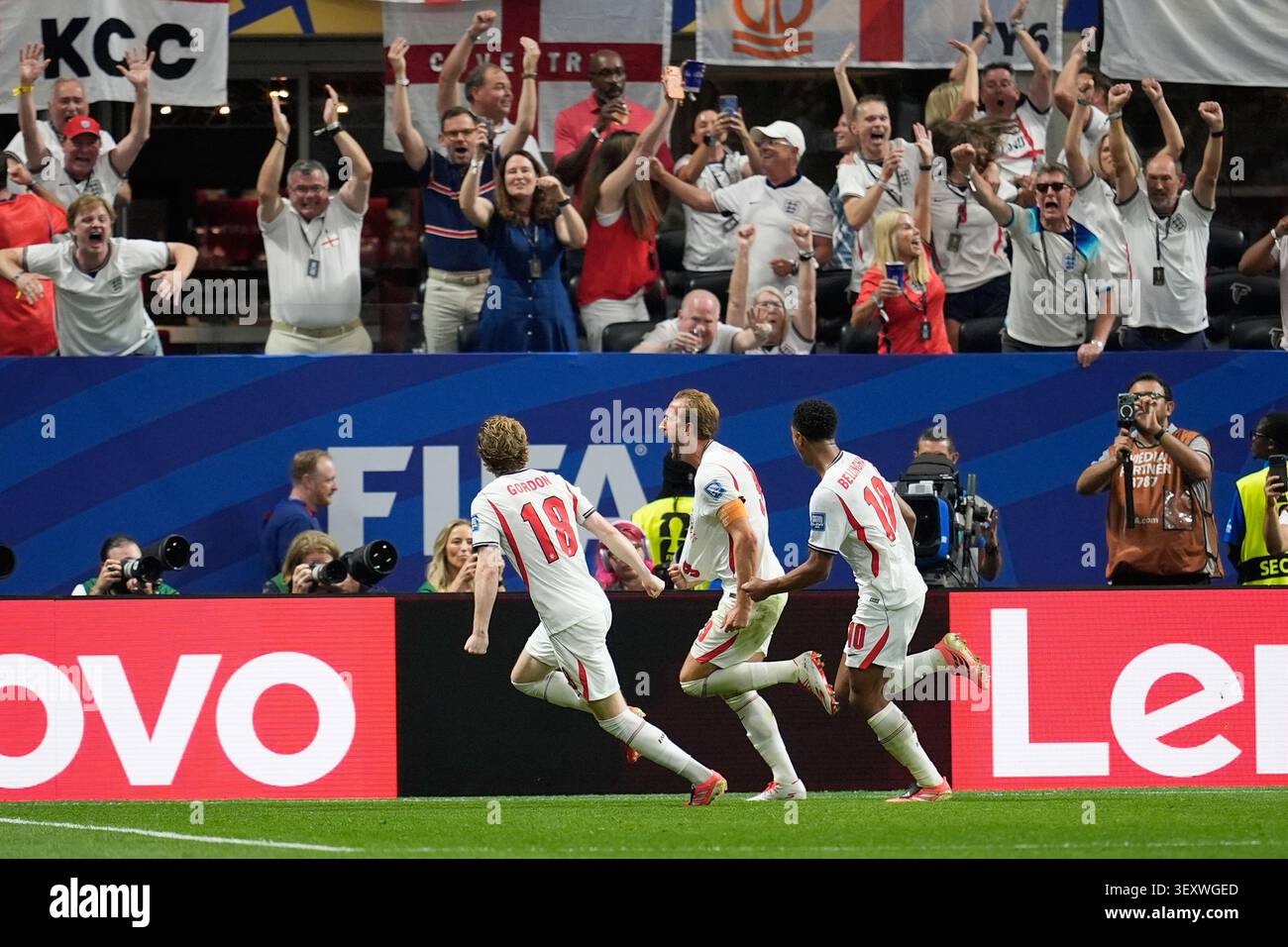 England's Harry Kane, center, celebrates scoring his side's opening ...