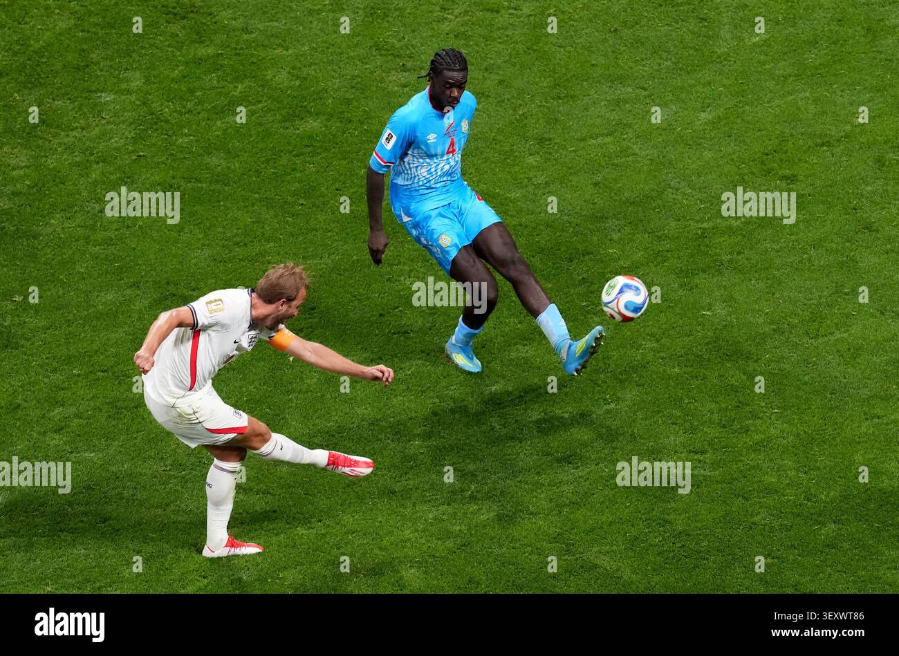 England's Harry Kane (left) scores his sides second goal during the ...