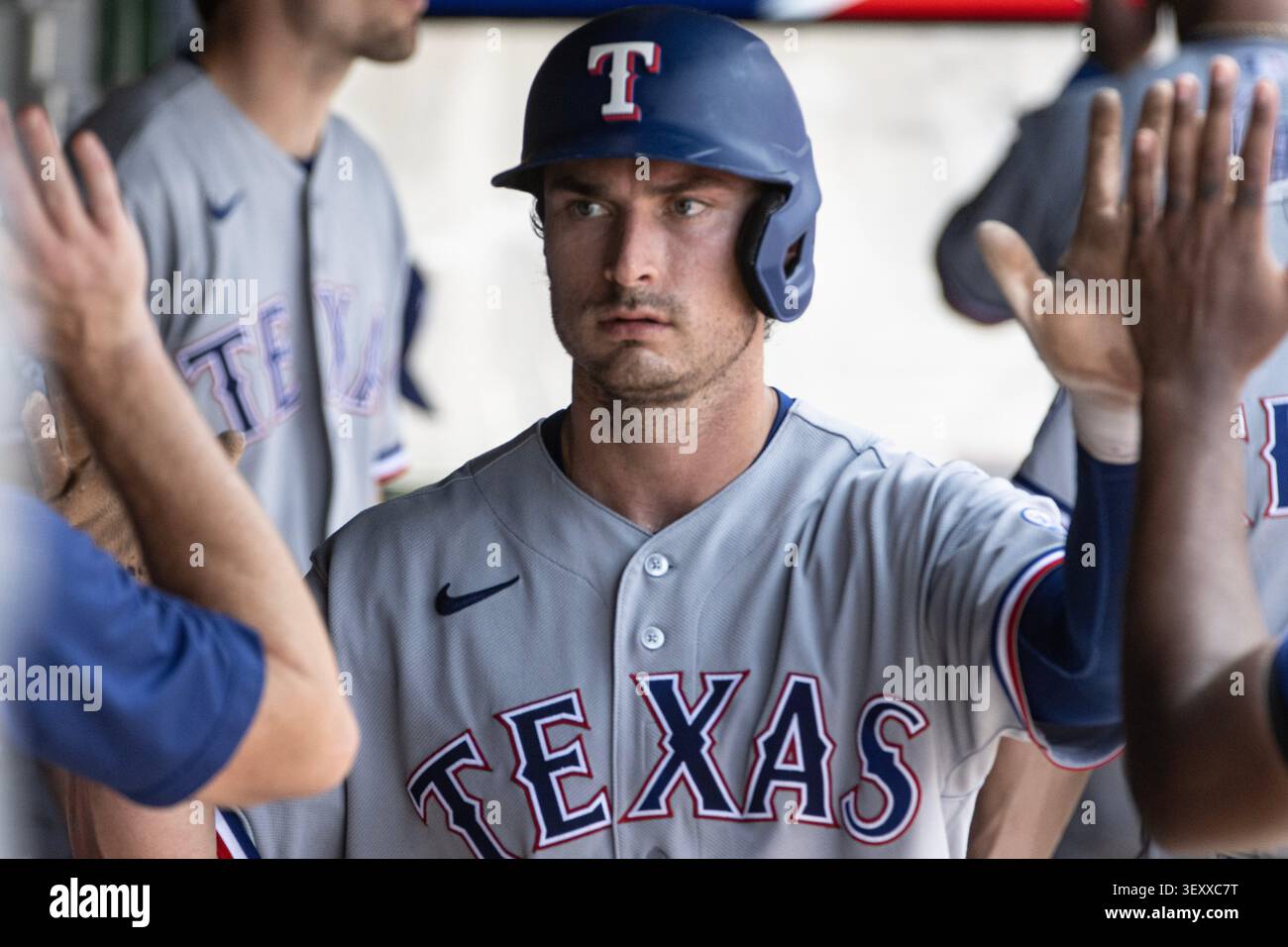 Texas Rangers' Justin Fosque is congratulated by his teammates after ...
