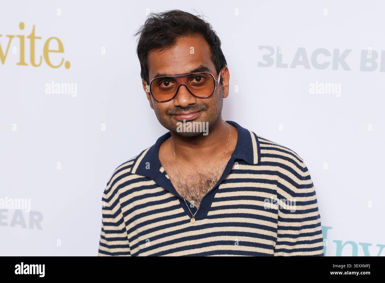 Aziz Ansari poses for photographers upon arrival at the premiere of the ...