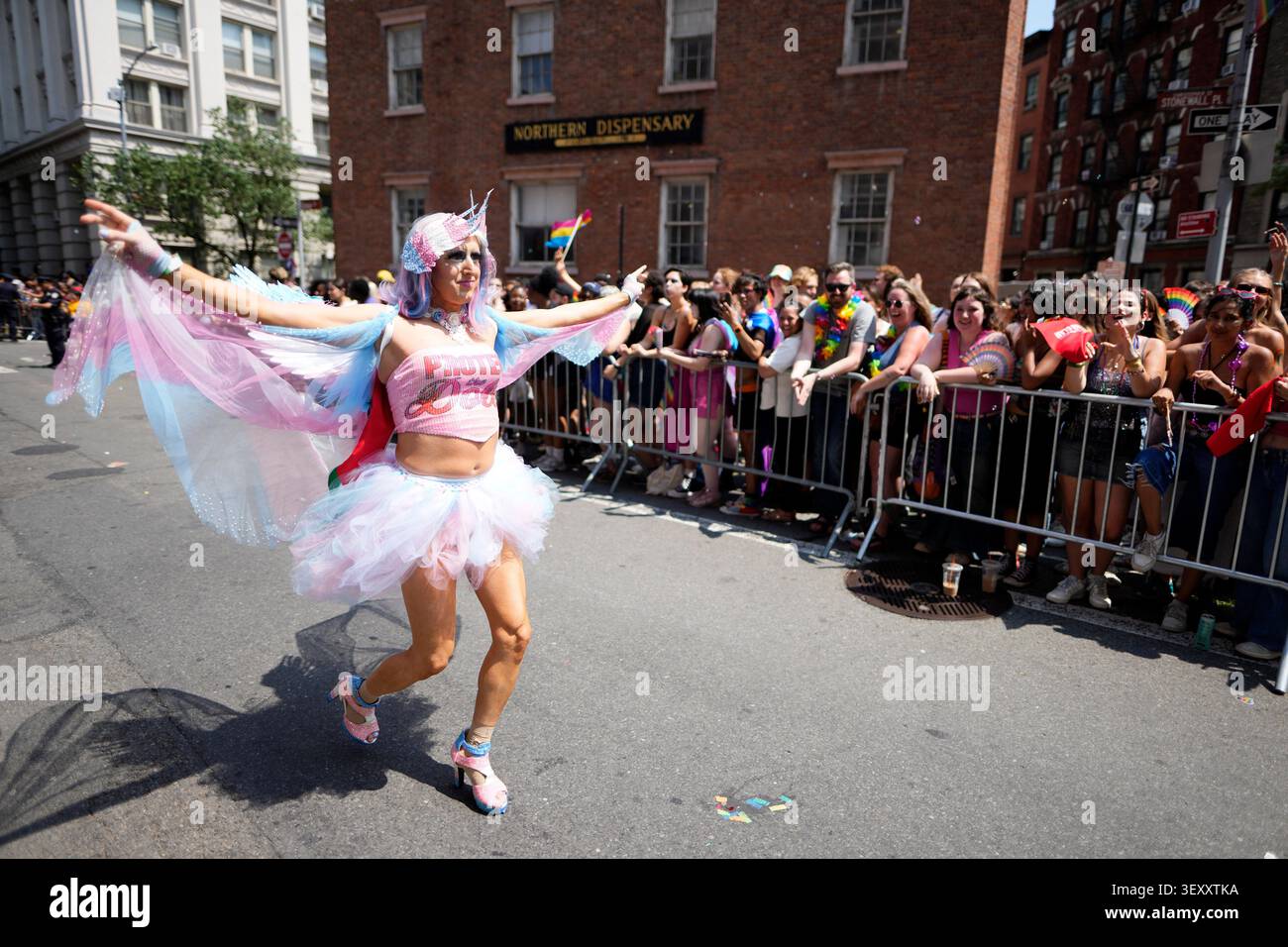 A parade-goers wears a "Protect the Dolls" shirt during the 57th annual ...