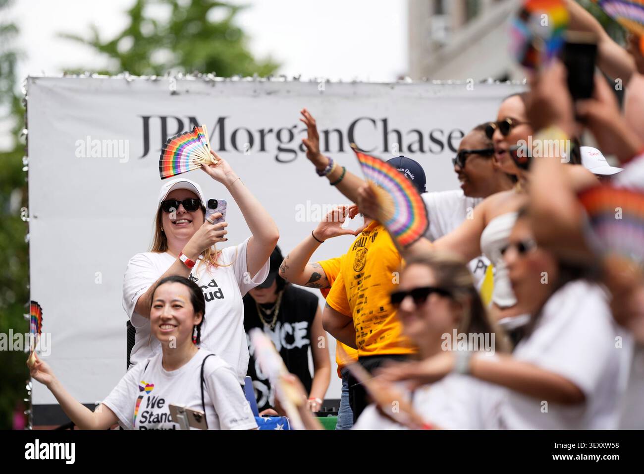 Participants from JPMorgan Chase ride a float during the 57th annual ...