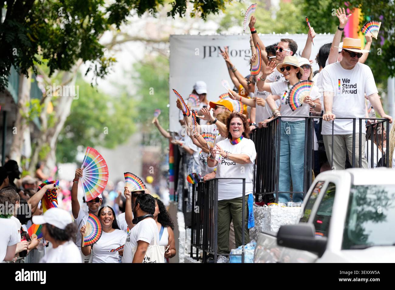 Participants from JPMorgan Chase ride a float during the 57th annual ...