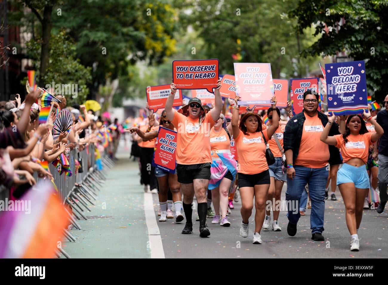 Participants from The Trevor Project walk in the 57th annual NYC Pride ...