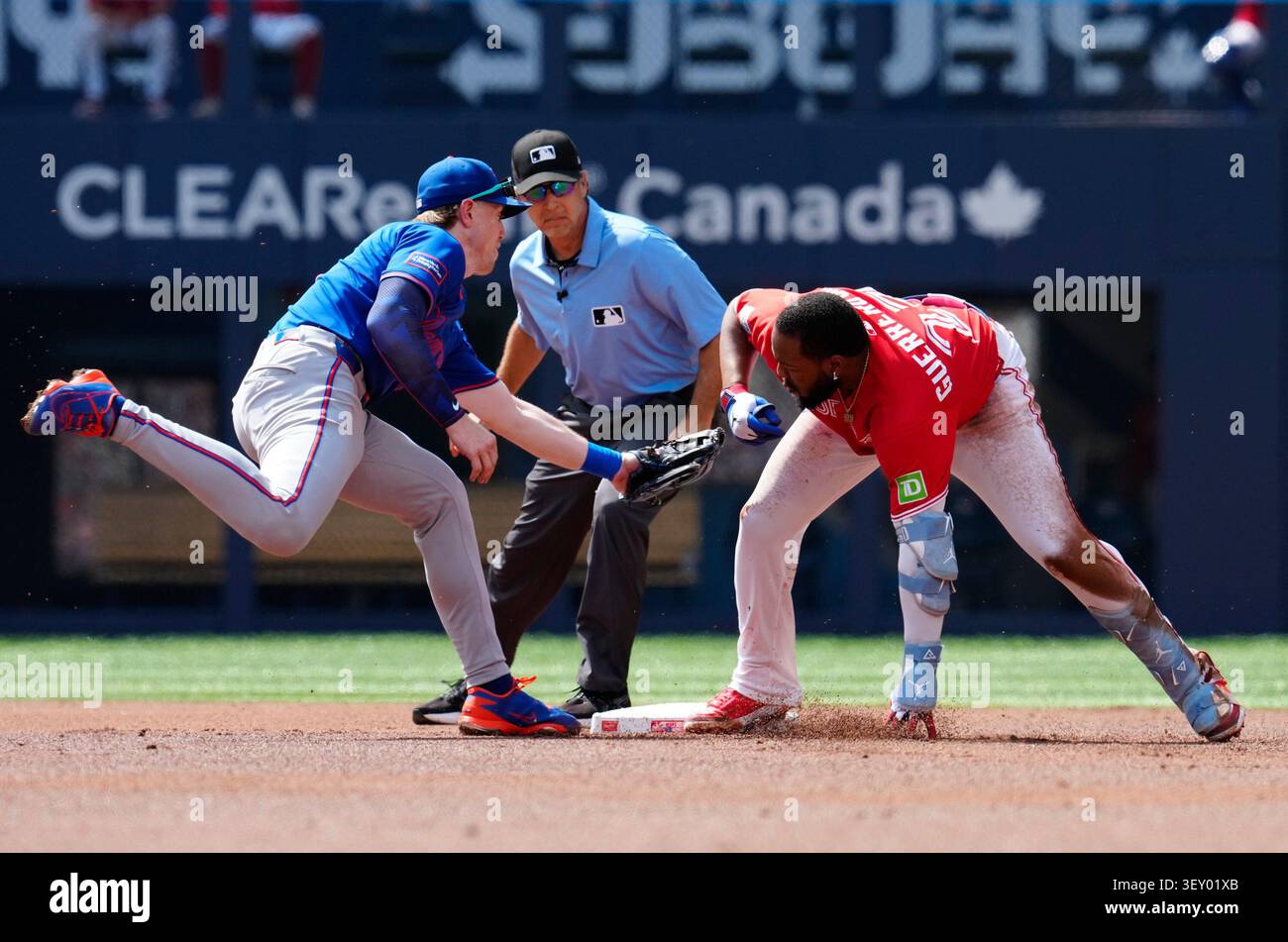 New York Mets third baseman Brett Baty (7) misses the tag on Toronto ...