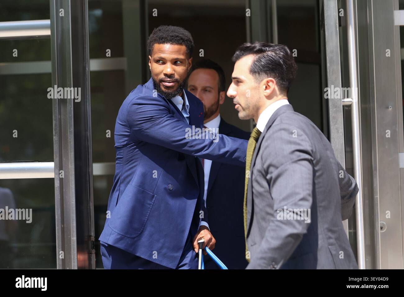 Former NBA player Malik Beasley, center, exits Brooklyn federal court ...