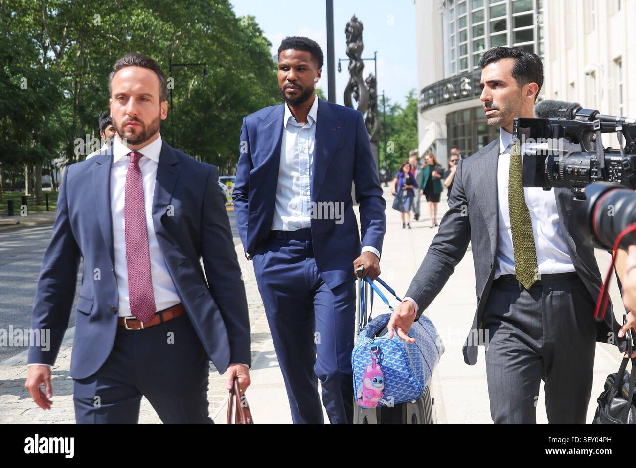 Former NBA player Malik Beasley, center, exits Brooklyn federal court ...