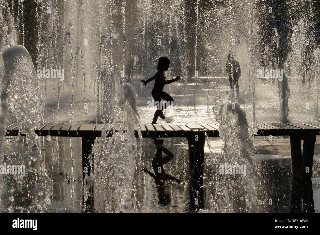 July 1, 2026, Kadikoy, Istanbul, Turkey: A child cools off during warm ...