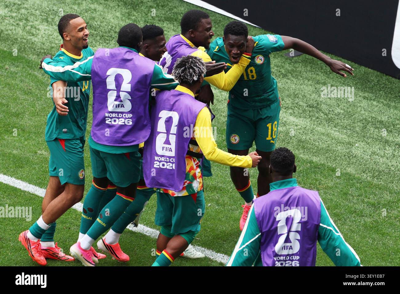 Senegal's Ismaila Sarr, right celebrates scoring his side's second goal ...