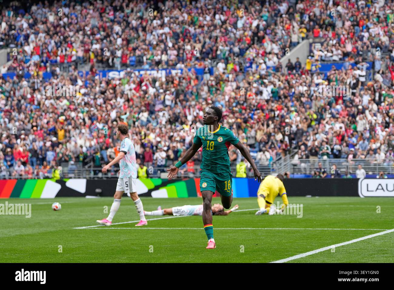 Senegal's Ismaila Sarr (18) celebrates scoring his side's 2nd goal ...