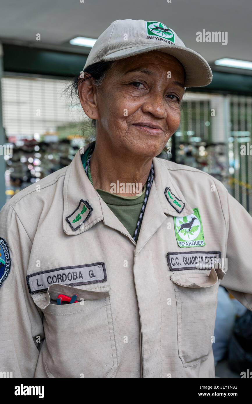 Portrait of L. Cordoba, volunteer at a clothing and aid distribution ...