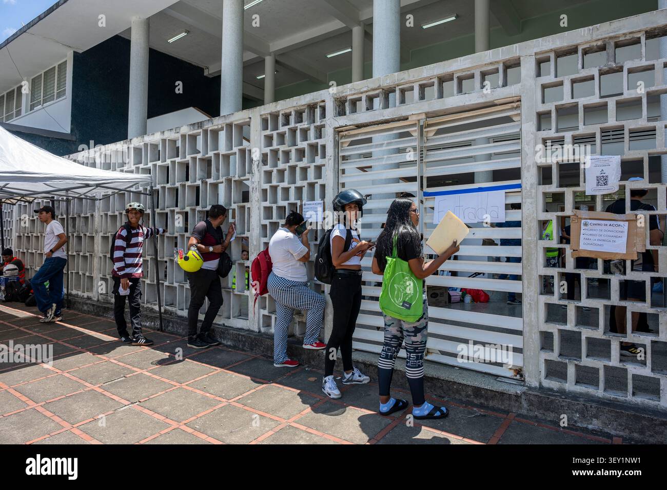 Volunteers organize medicines and medical supplies at the Collection ...