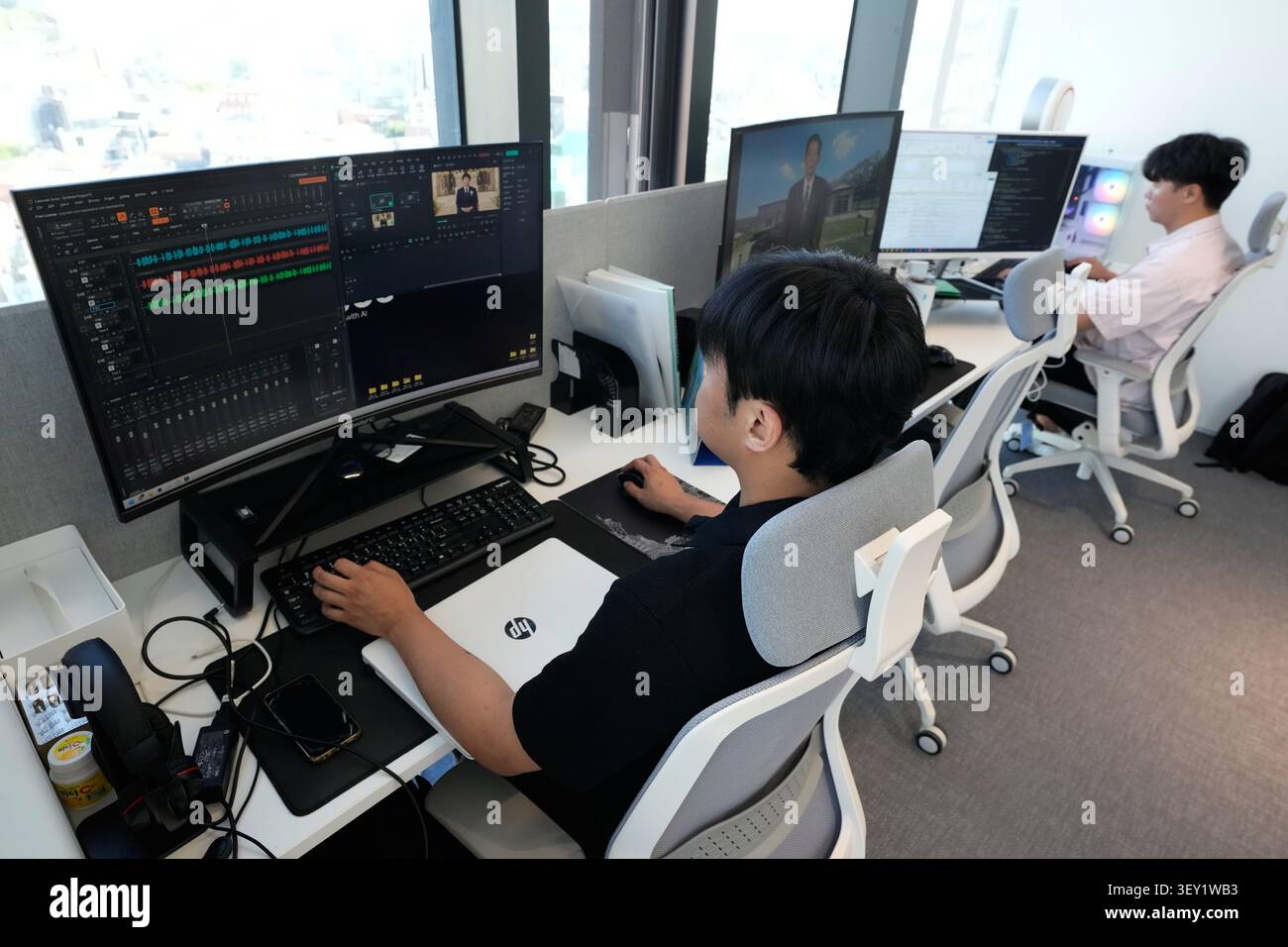 Employees at Seoul-based tech firm Vaice work at their office, South ...