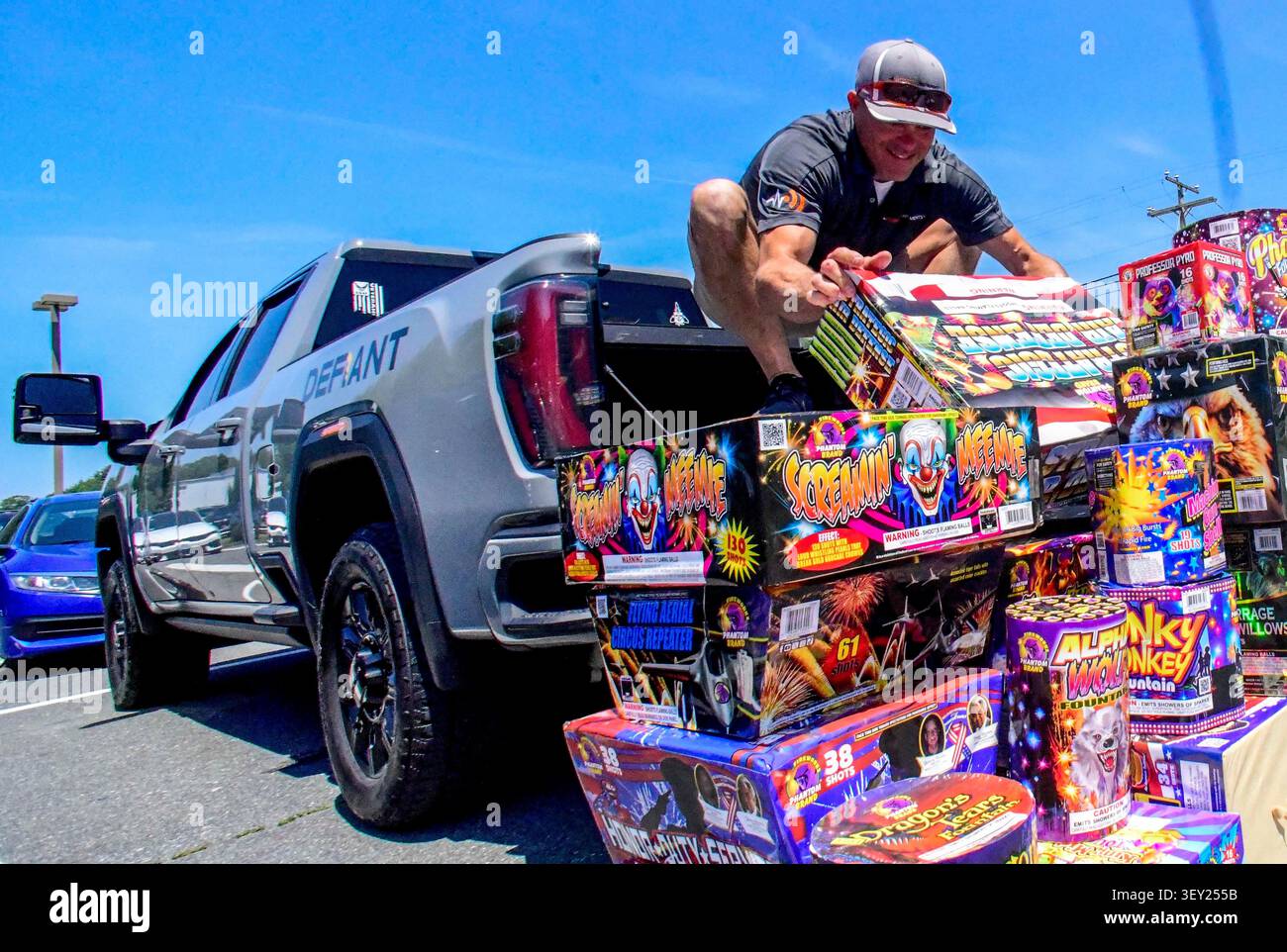 Mike, from New York, loads up the back of his pickup truck with ...