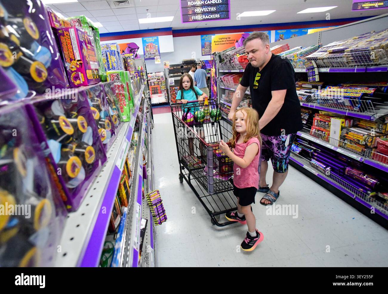 Jeff Hannifan, of Massachusetts, looks for the right fireworks for the ...
